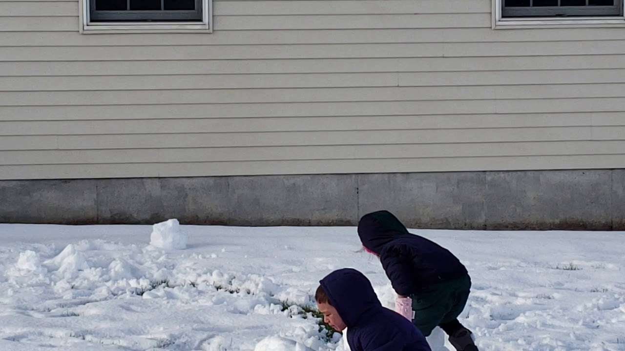 Making snowman and snow angel - YouTube