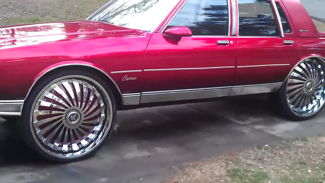 Kandy red box chevy on 28s swryl floaters - YouTube