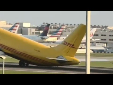 DHL-A313 Massive Landing Tail Strike Sparks & Go Around @Heathrow - YouTube