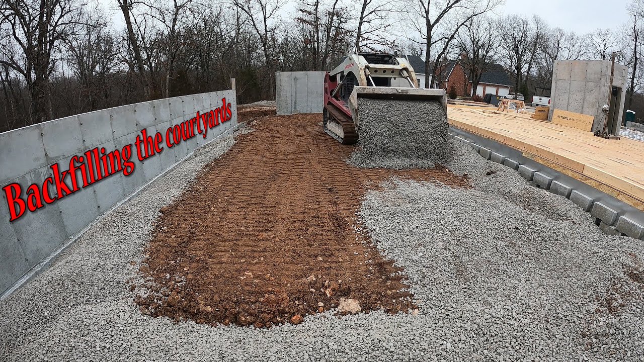 Backfilling The Courtyards With Clean Rock - YouTube