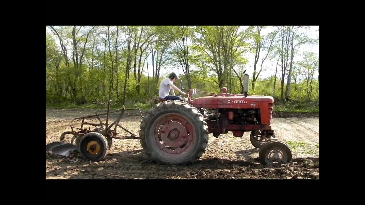 Spring 2011 Farmall MD plowing - YouTube