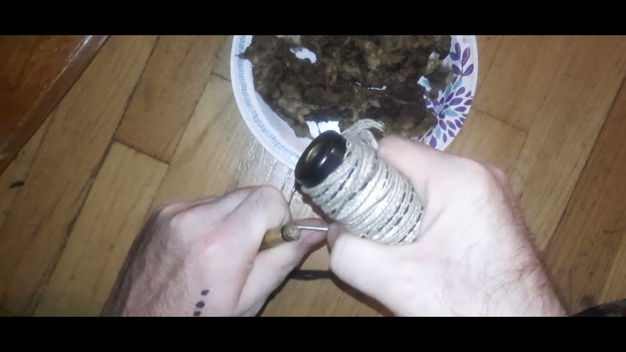 Fire piston & wood ash lye bullrush (demonstration. No commentary ...