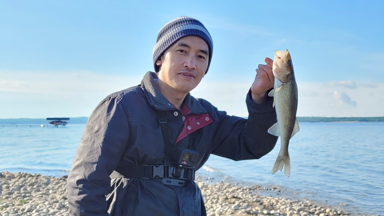 walleye fishing from the shore in wabamun lake nice and clear water ...