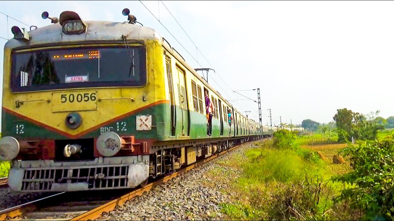 EMU Local train number one entered through a curve and crossed with EMU ...