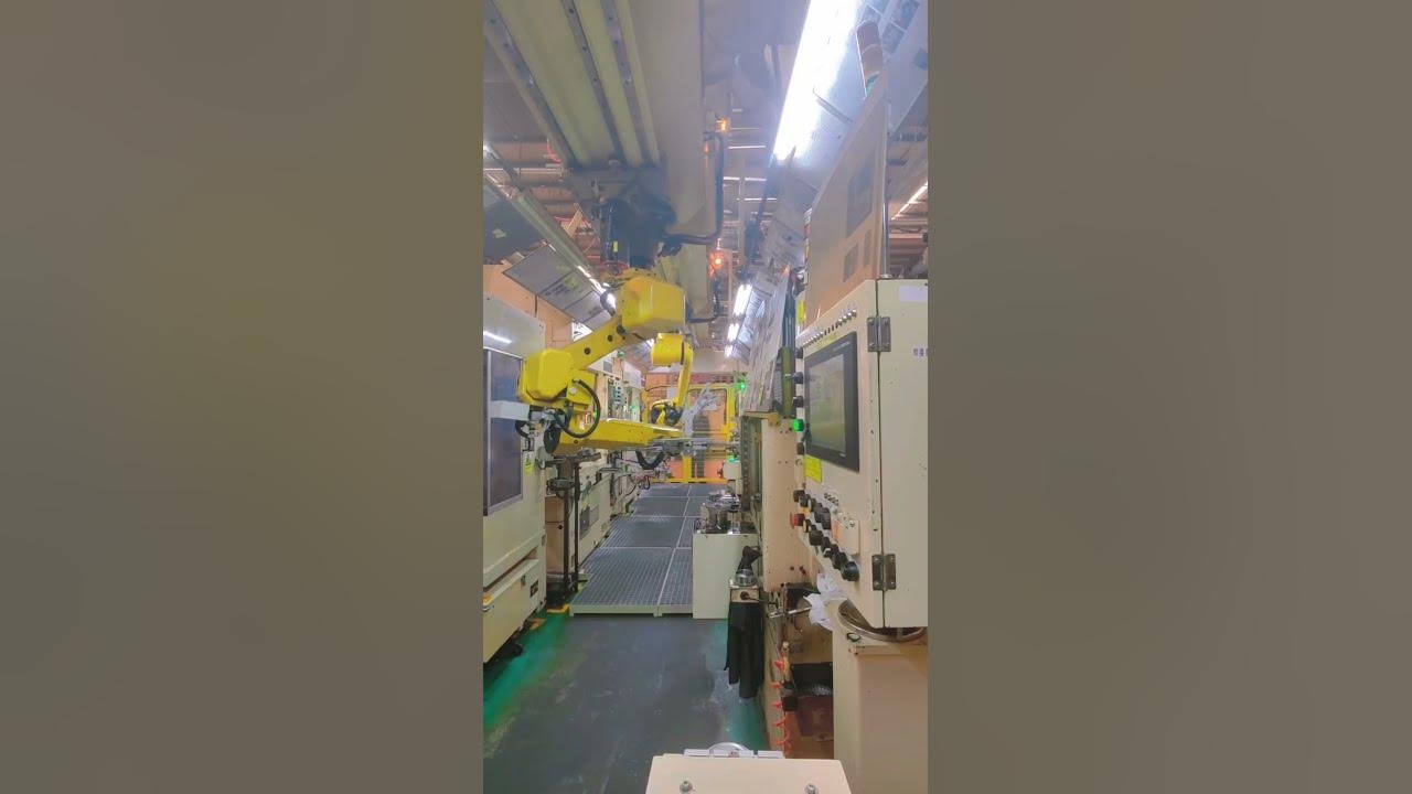 Fanuc M-20iA robot working for loading and unloading. #automation #robotic #robotarm - YouTube