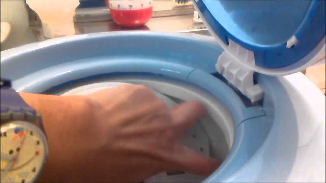 Washing laundry using a plunger - YouTube