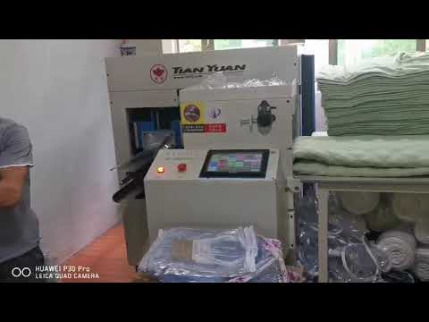 Sleeping bag roll packing machine/duvet packing machinery/quilt ...