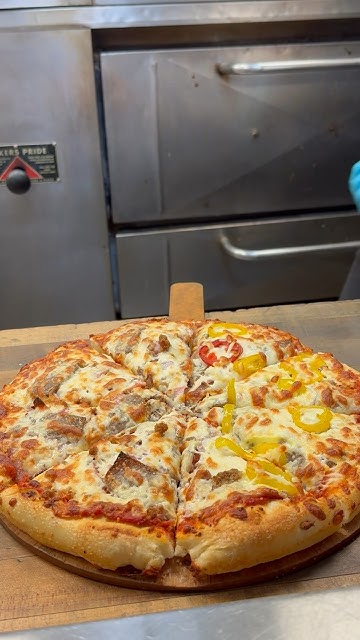 If you can not decide which pizza you want to eat, half and half is perfect.🍕 #pizza #canadafood ...