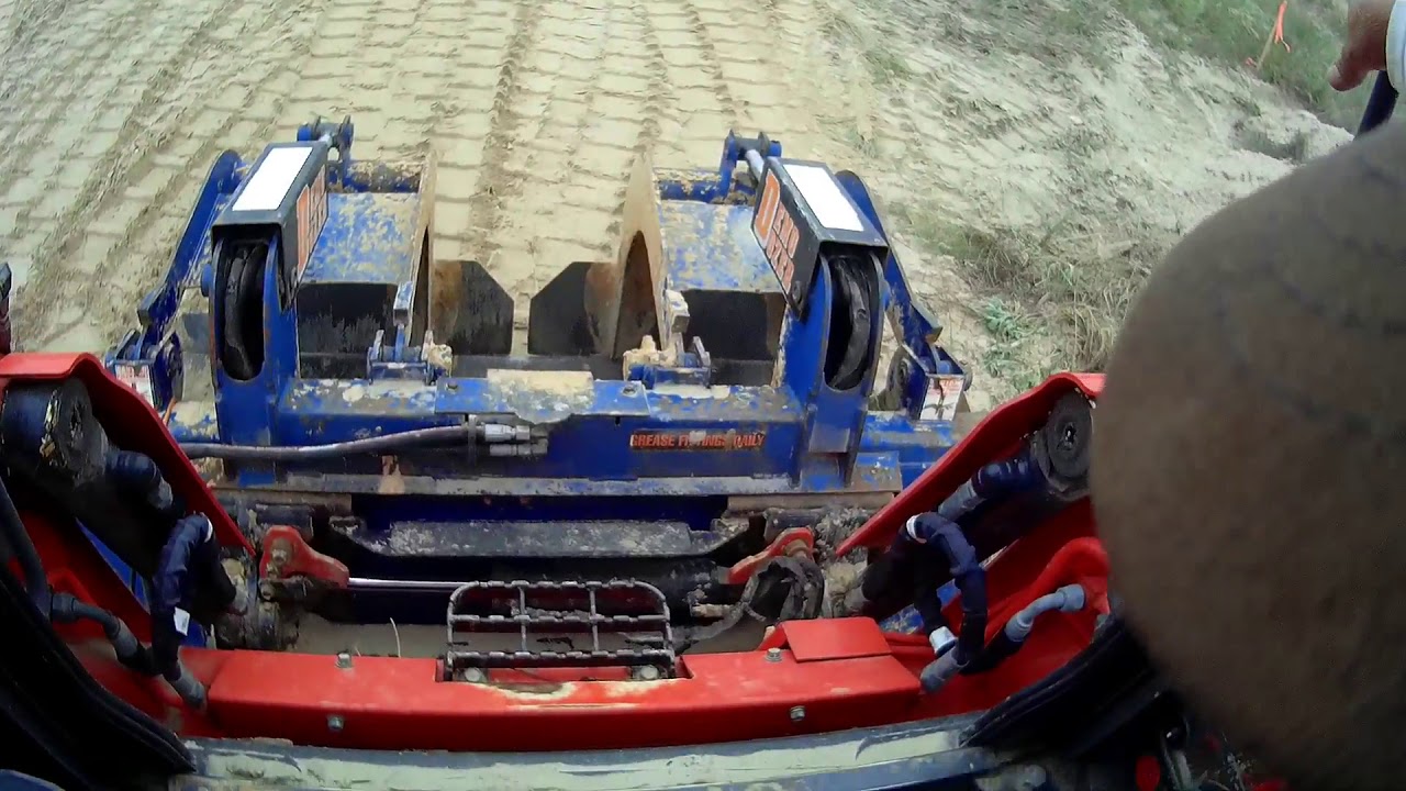 Moving a sand dune 50 ft. toward beach - YouTube