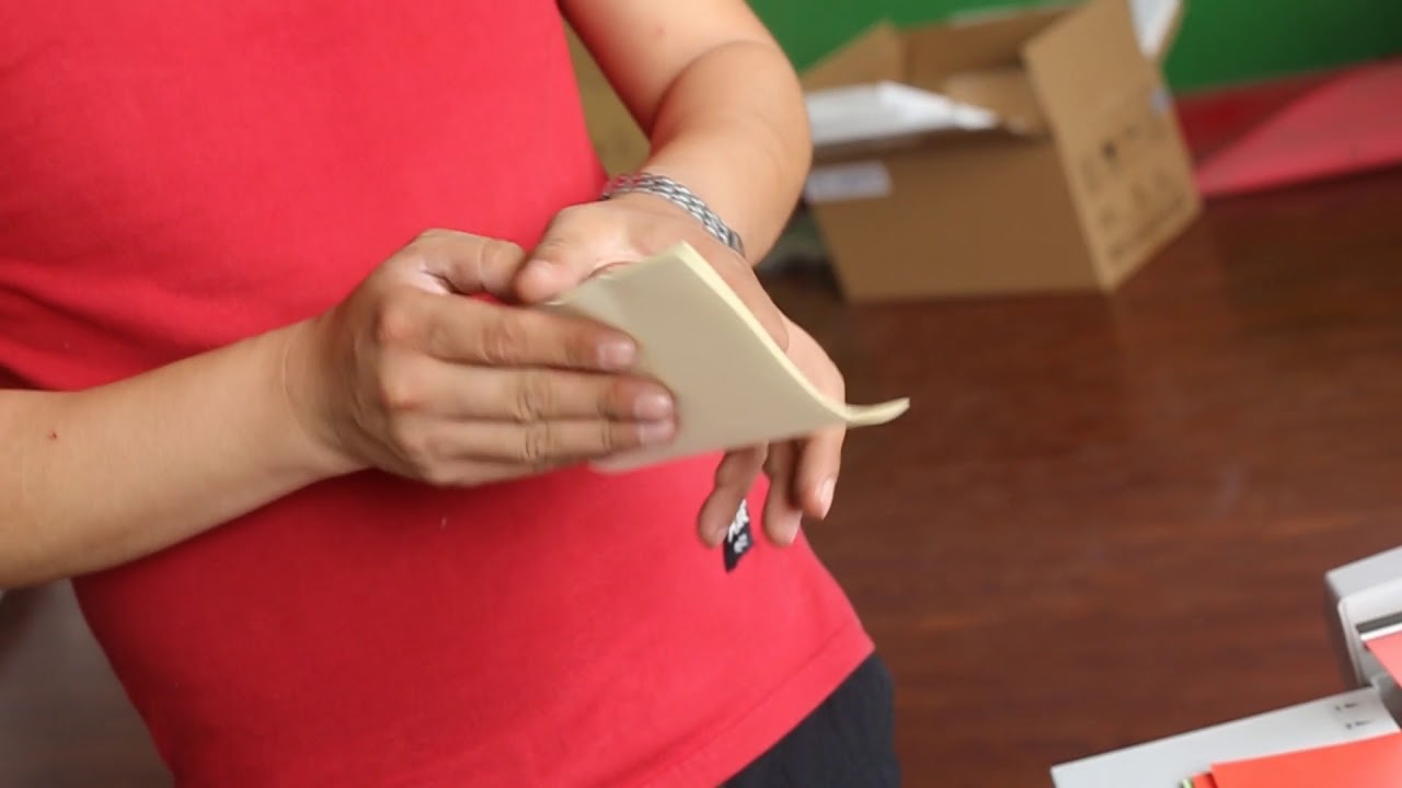 DC 200L manual paper folding machine - YouTube