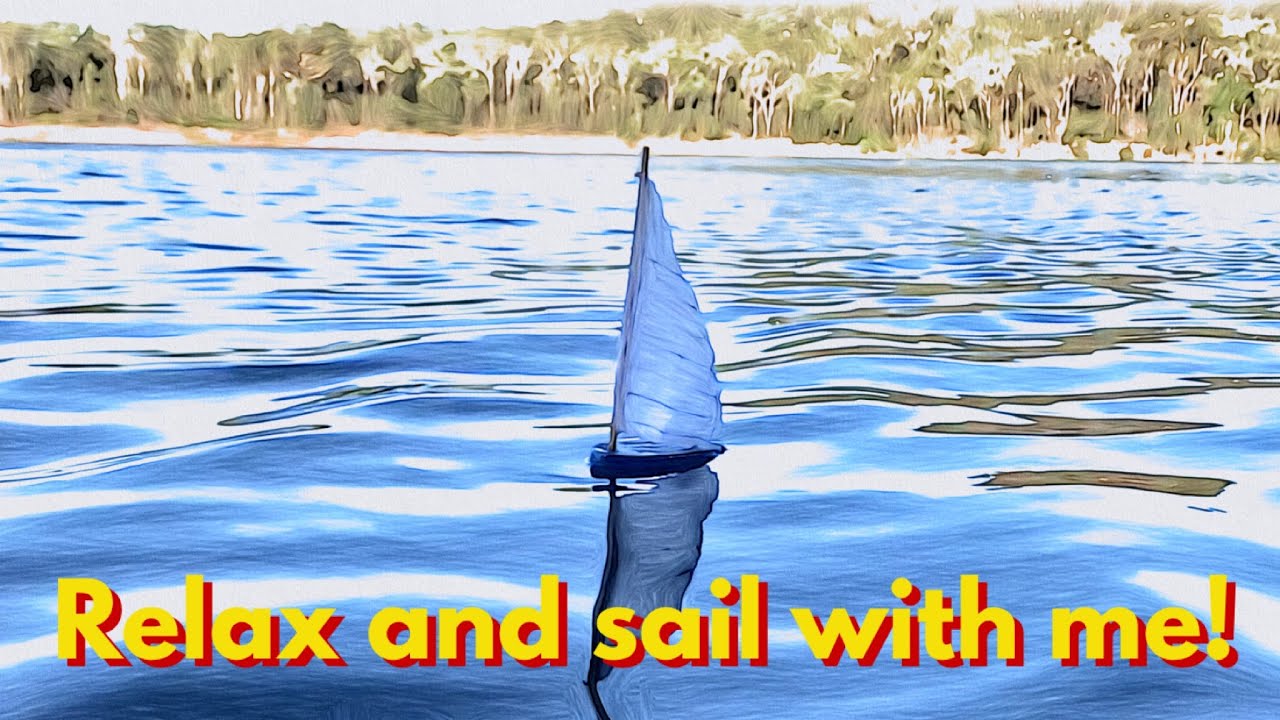 A relaxing video of a free sailing pond yacht-meandering along on a ...