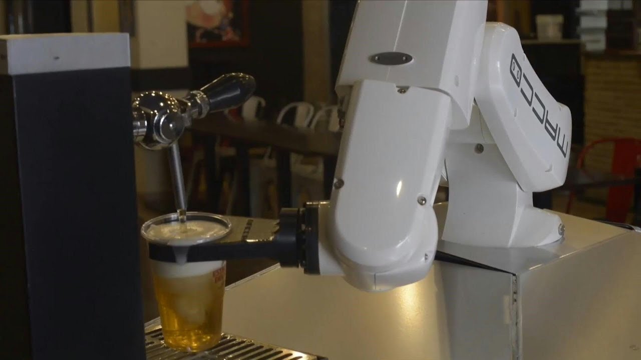 In Spain, robot barman serves up contact-free beers | AFP - YouTube