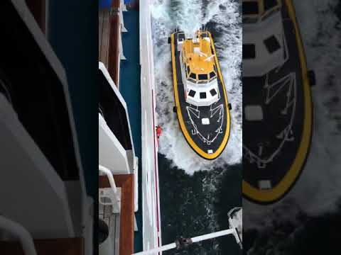 Man jumps off cruise ship onto another boat *crazy* - YouTube