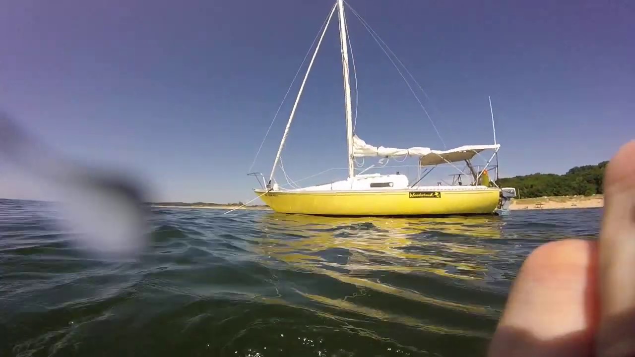 Mirage 24 Sailboat Swim Around. - YouTube