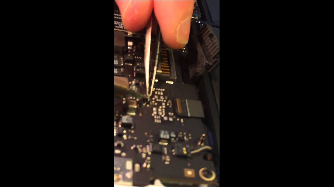 Removing the old fuse with soldering iron, macbook air a1370 backlight ...