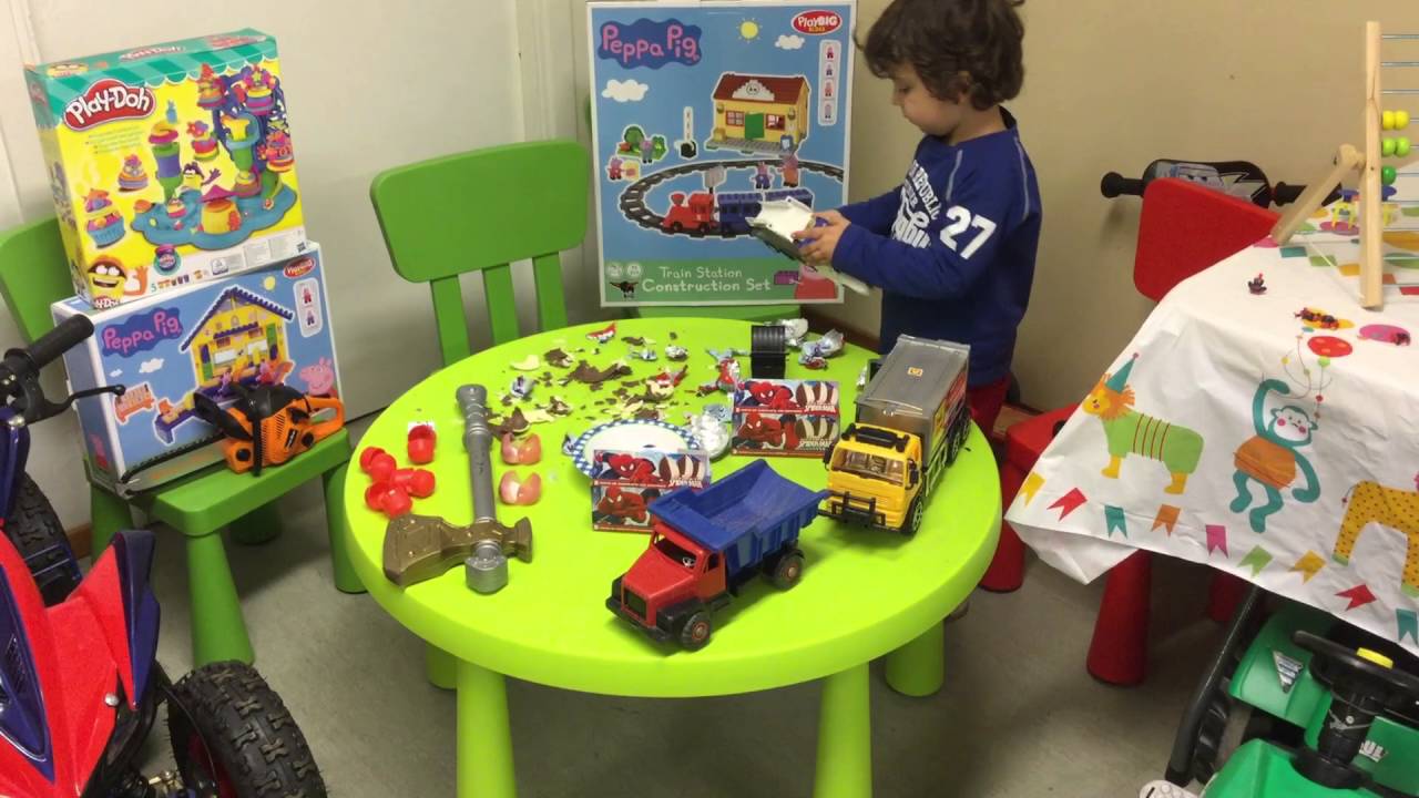 Eric plays with his toy cars and eat chocolate from the surprise eggs ...