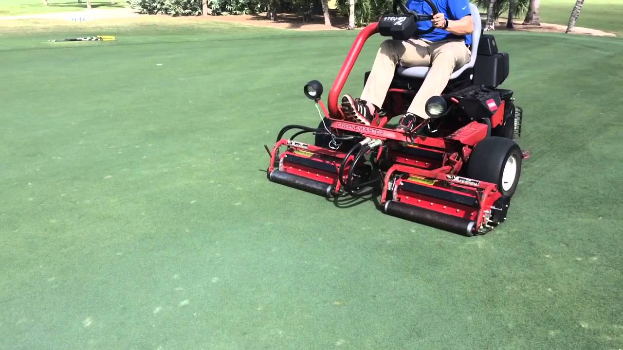 Solid tine demonstration at Gulfstream Golf Club on TifEagle greens ...