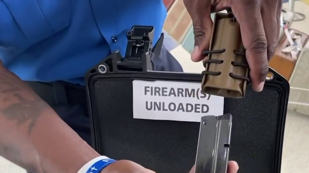 TSA demonstrates how to safely travel with guns - YouTube