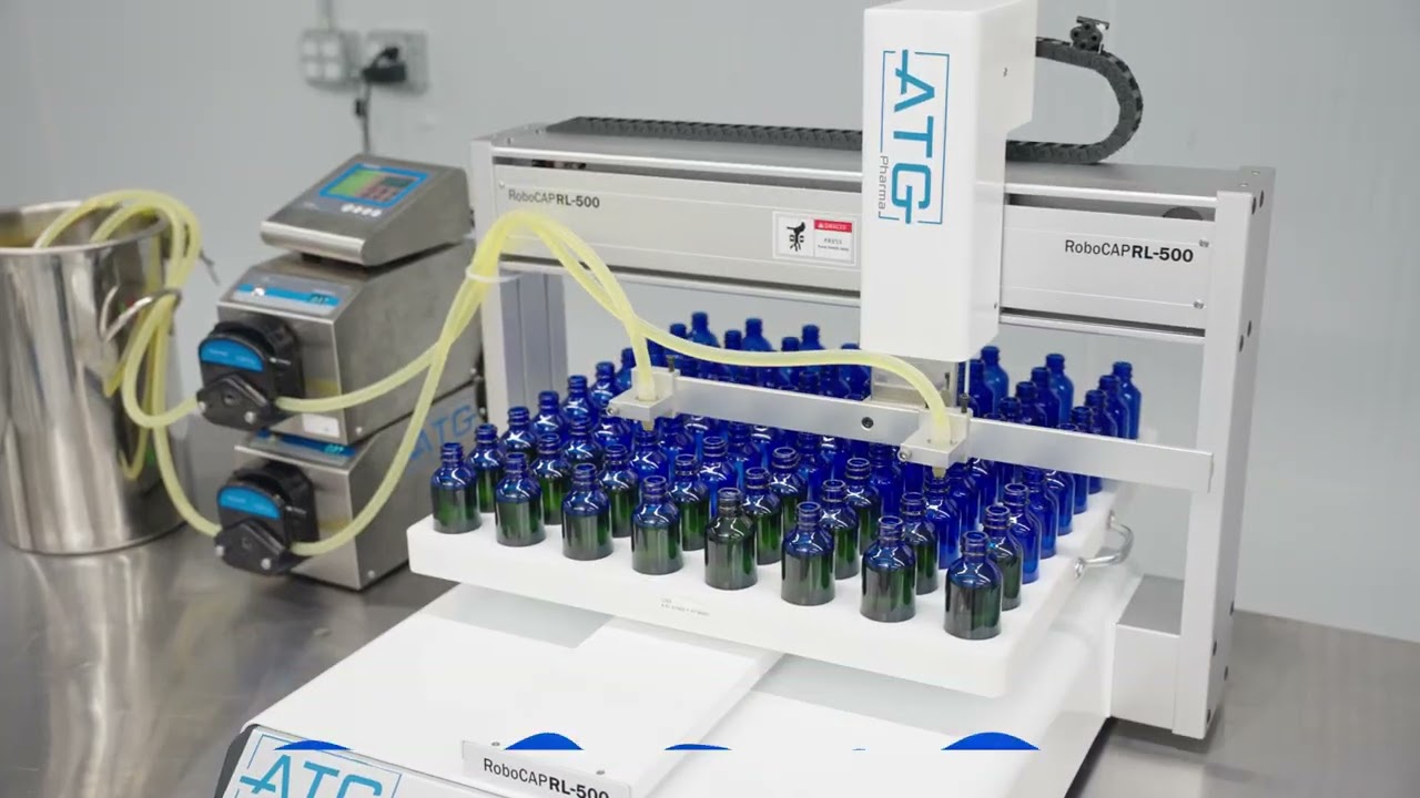 ATG Bottle Filling Machine - RoboCAP RL-500 - YouTube