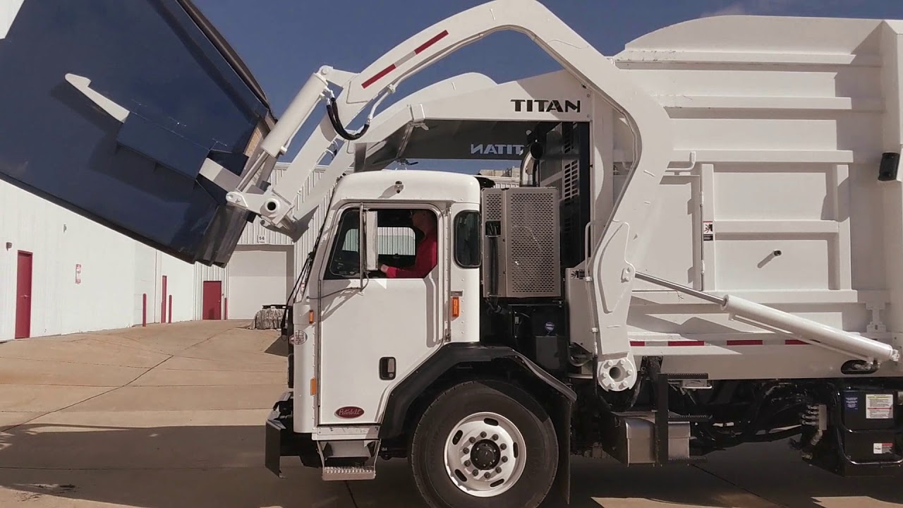 Titan Auto Dump Front Loader Demonstration - YouTube