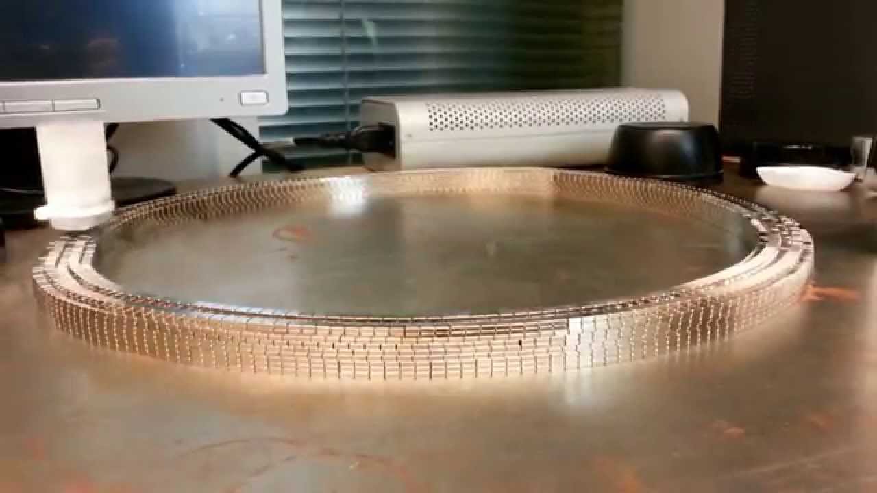 Superconductor levitating on top of magnetic track at Imperial College ...