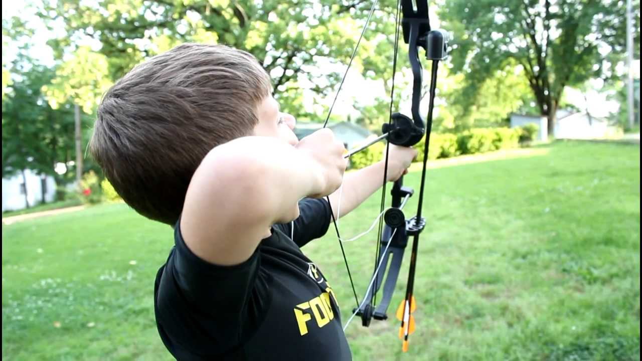 Carter Wise tooth pull.....with bow and arrow. - YouTube