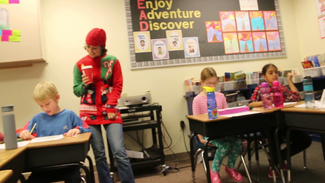 3rd grade working hard on a math, yet still festive! - YouTube
