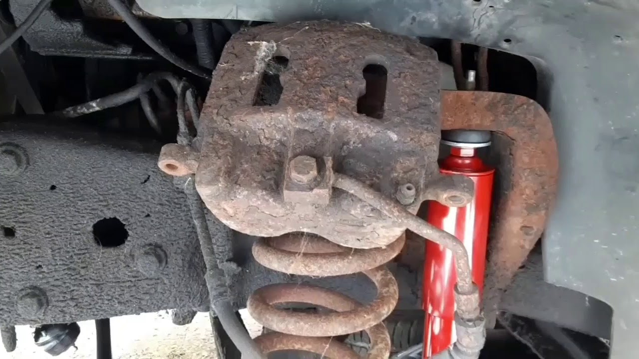 Installing wheel bearings and brakes on ford ranger - YouTube