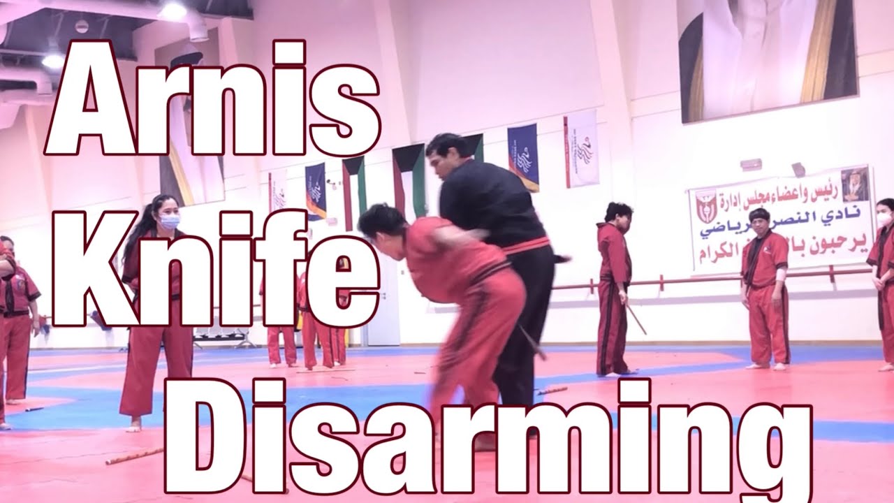 empty hand disarming technique with arnis and knife - YouTube