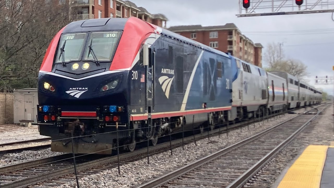 Amtrak 310 leading a train with a shave and haircut hornshow at Morton ...