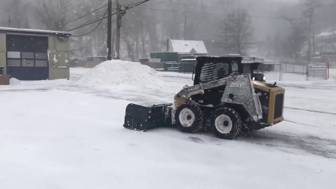 ASV RS60 clearing snow - YouTube