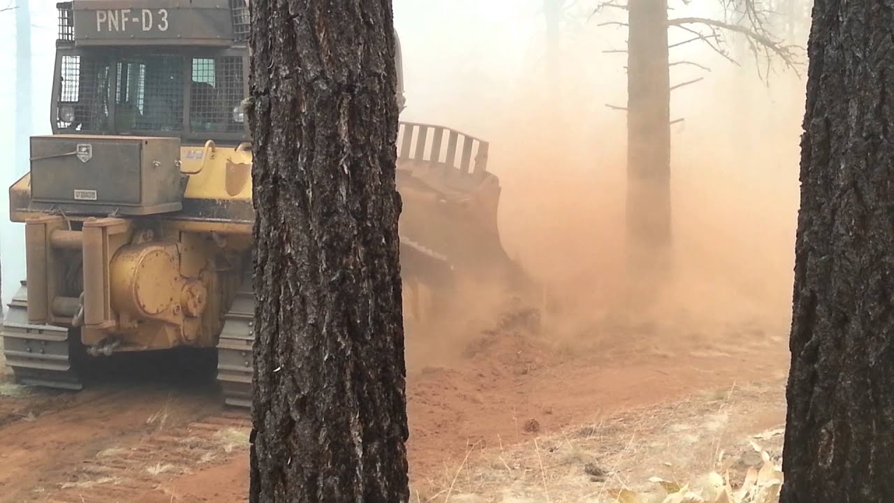 Dozer making fire line - YouTube