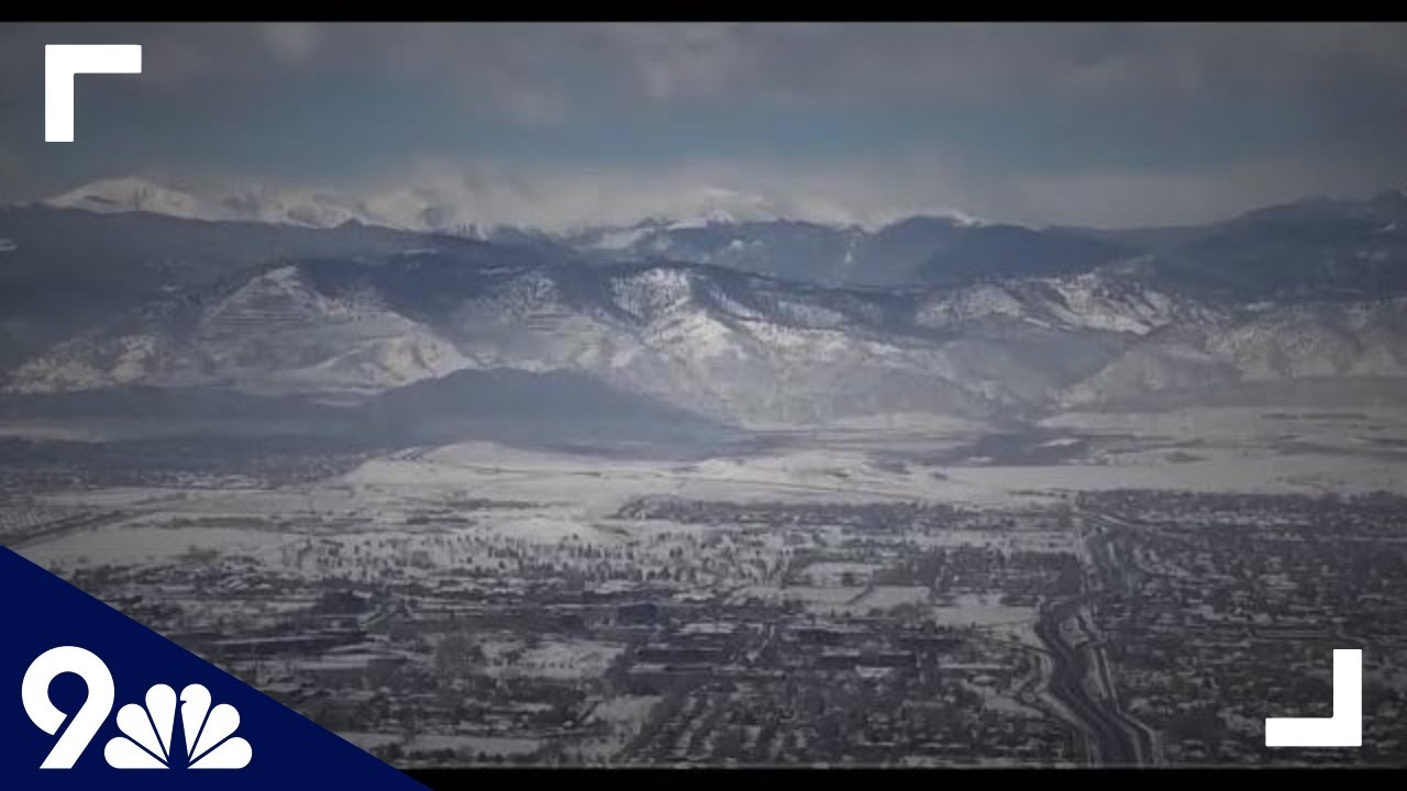 RAW: Aerial view of snow-capped mountains along Colorado’s Front Range ...