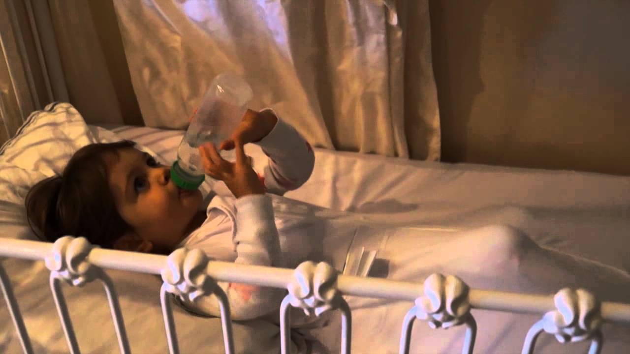 The Slumber Sleeper™ - 4-in-1 crib sheet to help baby sleep - YouTube