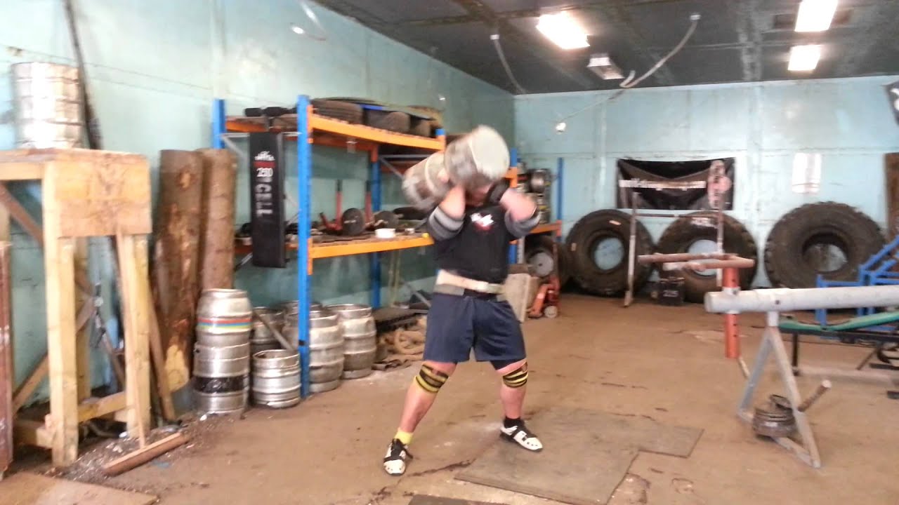 100kg dumbell for an easy set of 4 - YouTube