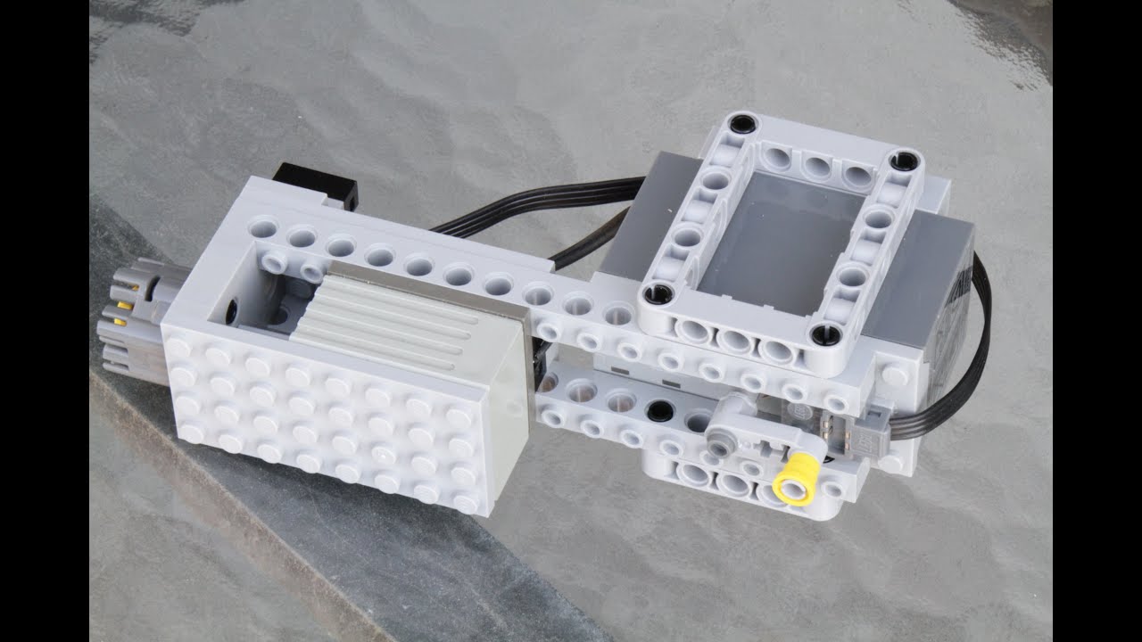Technical LEGO: Electric top spinner and rubber band boat winder - YouTube