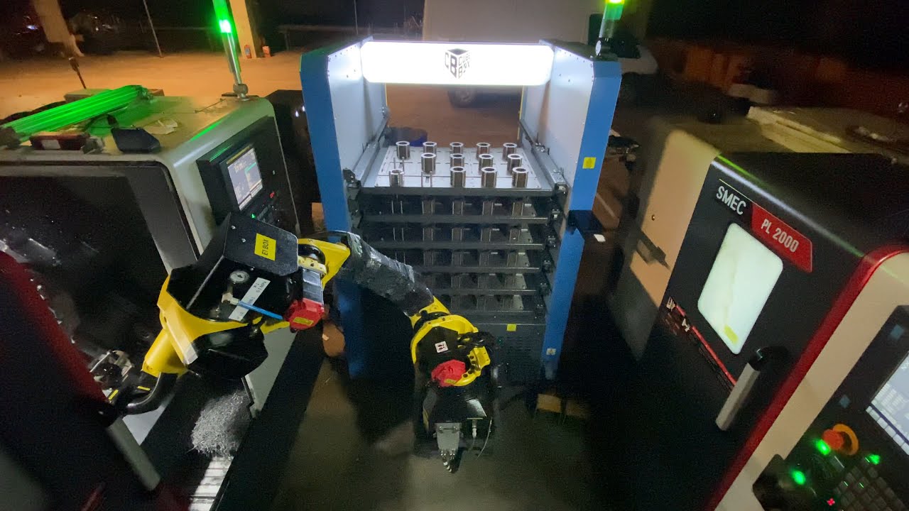 Two SMEC PLC2000 CNC Lathe Feeding Application with Fanuc M10ID/12 ...