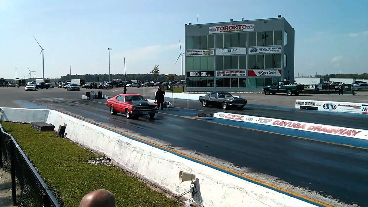 340 Duster vs big block Camaro - YouTube