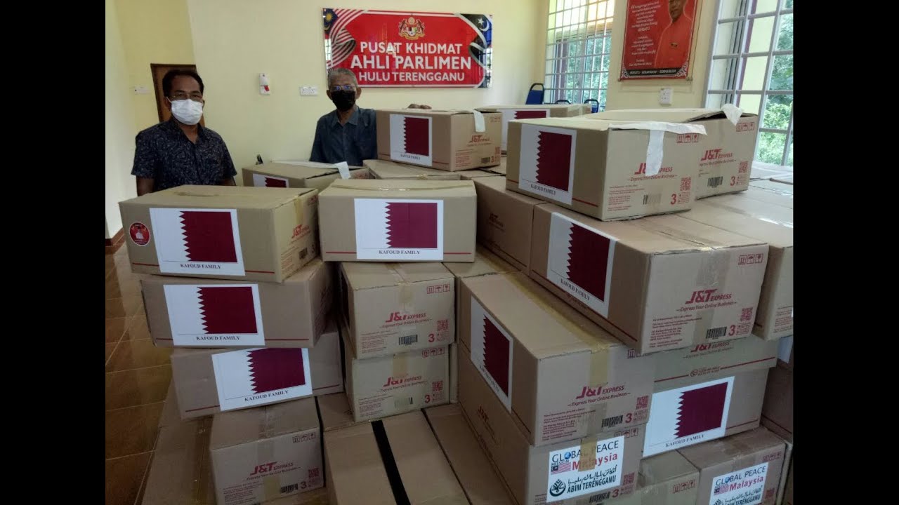 Qatar Embassy donates food baskets to the needy in EMCO areas - YouTube