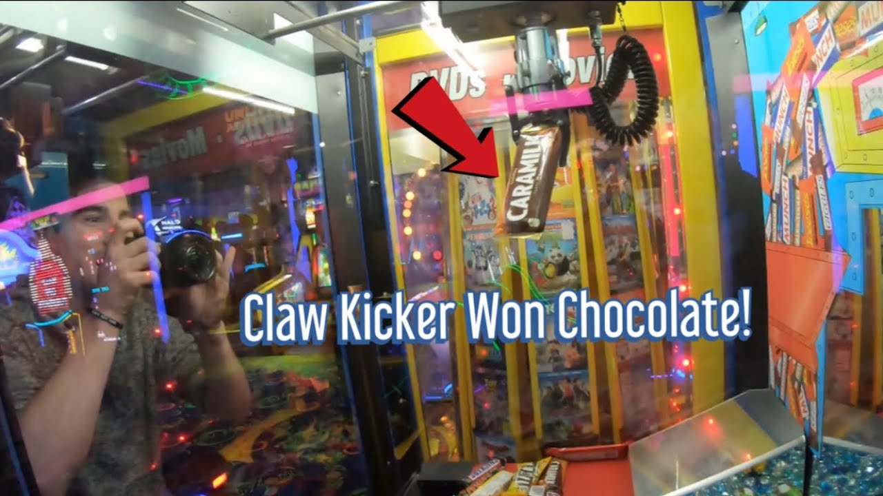 We won chocolate bars from the claw machine! - YouTube