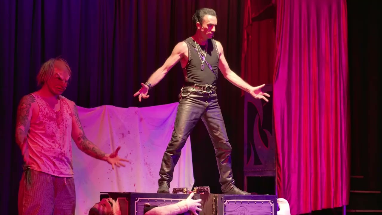 The Kiwi Horror Illusionist Chainsaws a girl in half. - YouTube