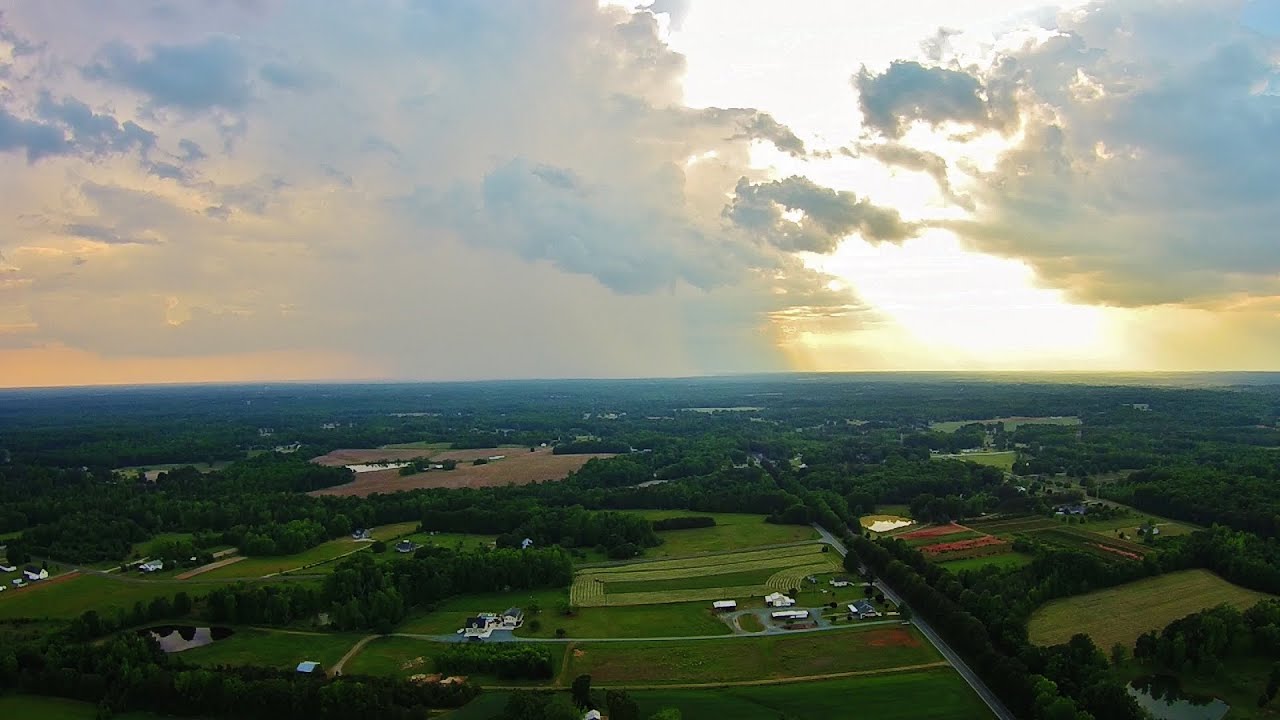 Aerial View of Distant Approaching Rain Storm - YouTube