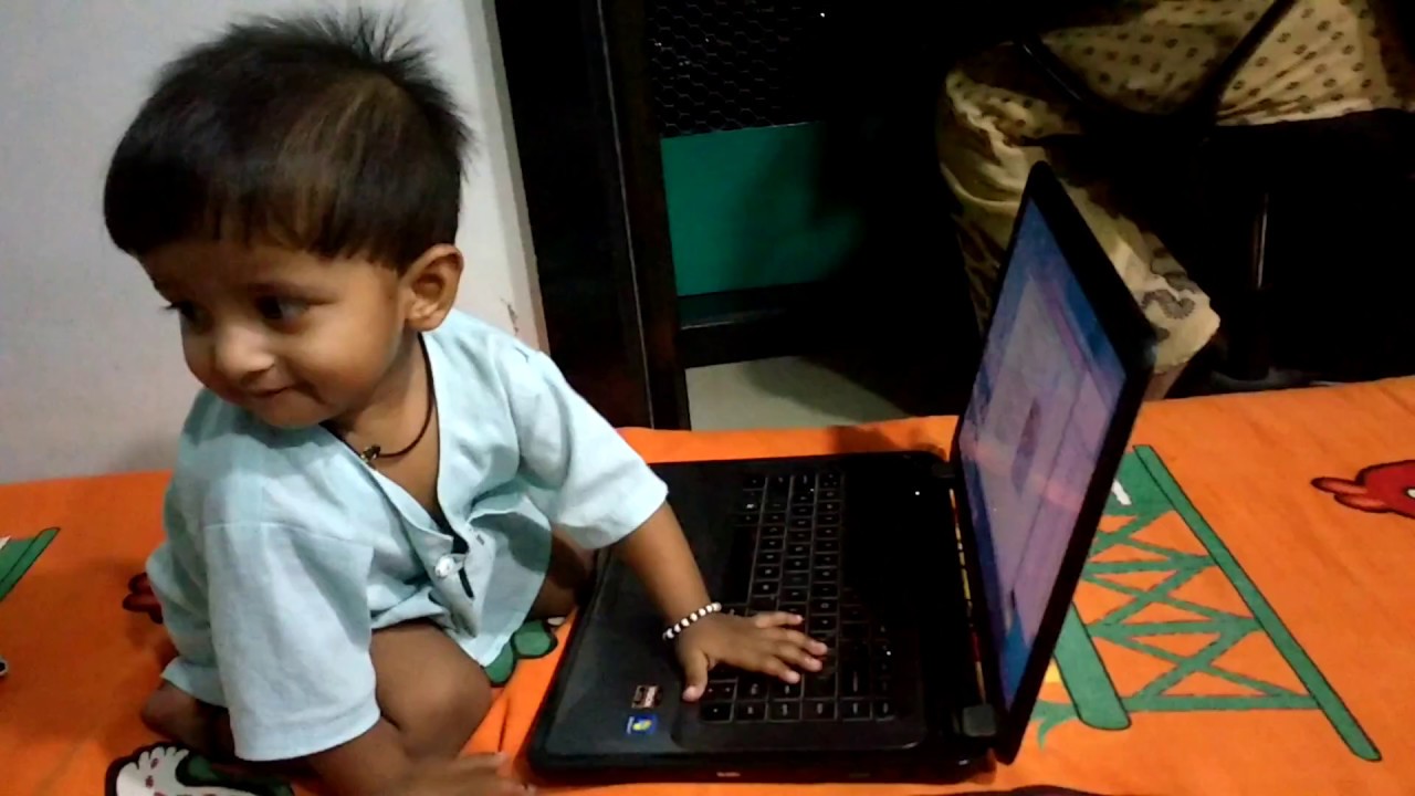 BABY PLAYING WITH LAPTOP - YouTube
