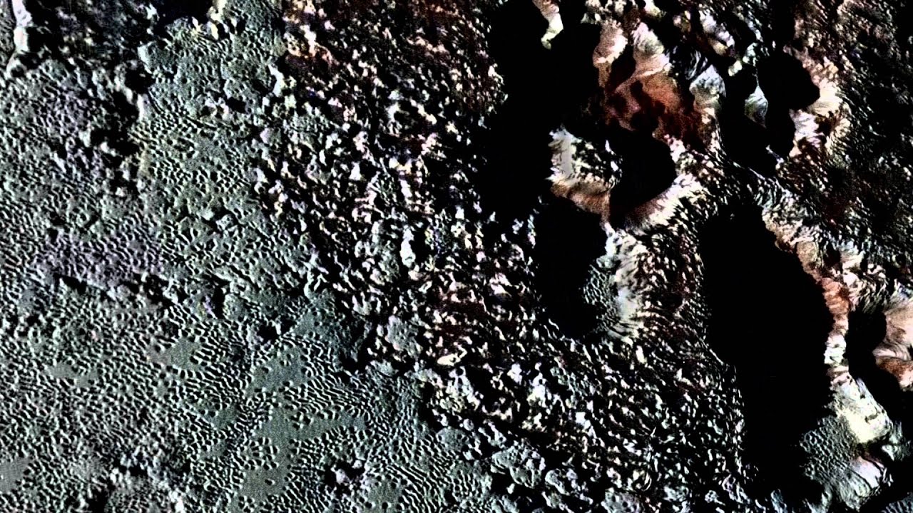 Flying over Pluto's Krun Macula - YouTube