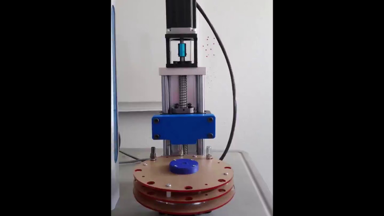 Carousel Press Capper by Green Leaf Robotics - YouTube