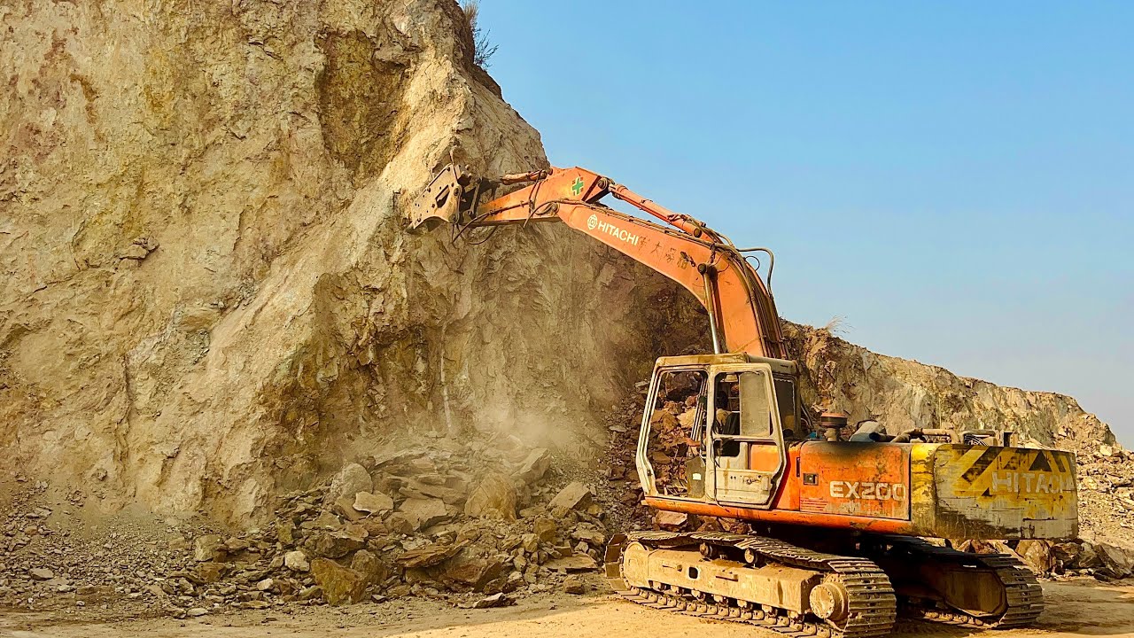 Excavator Destroying Solid Rocks on Mountain| Real Rock Breaking Action ...