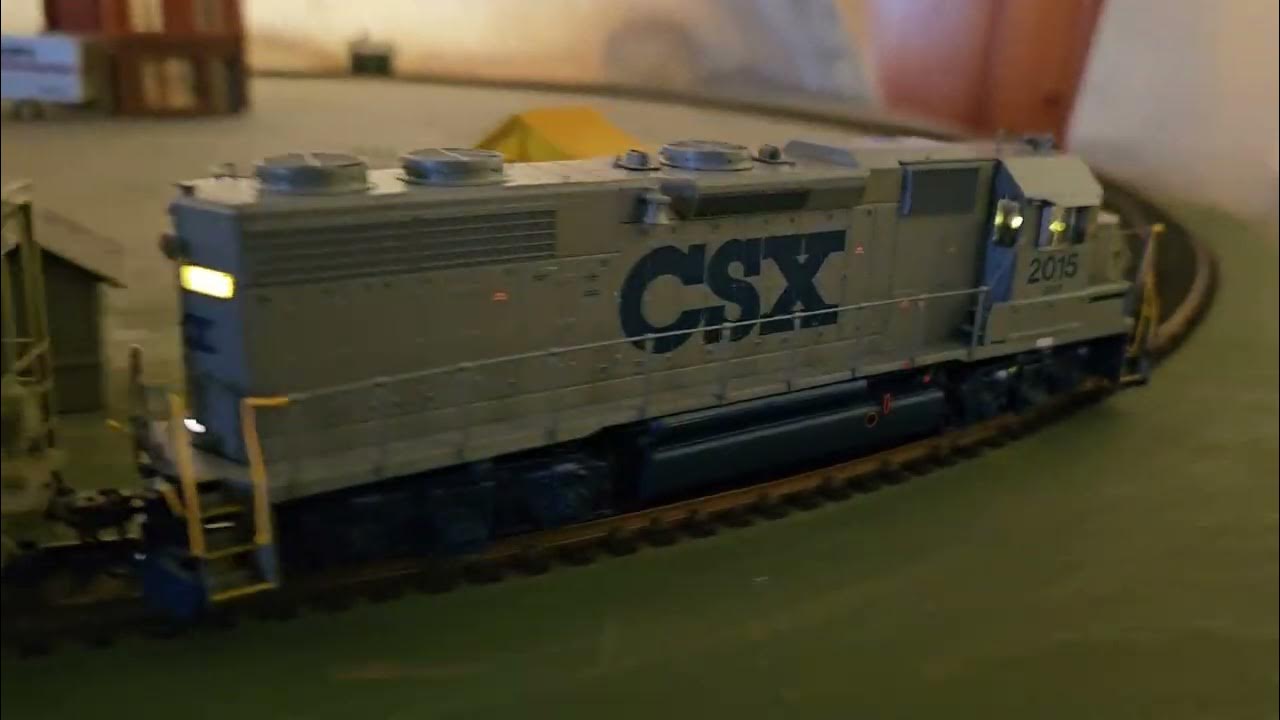 Rapido HO Scale CSX EMD GP38 pulling a short train!! - YouTube