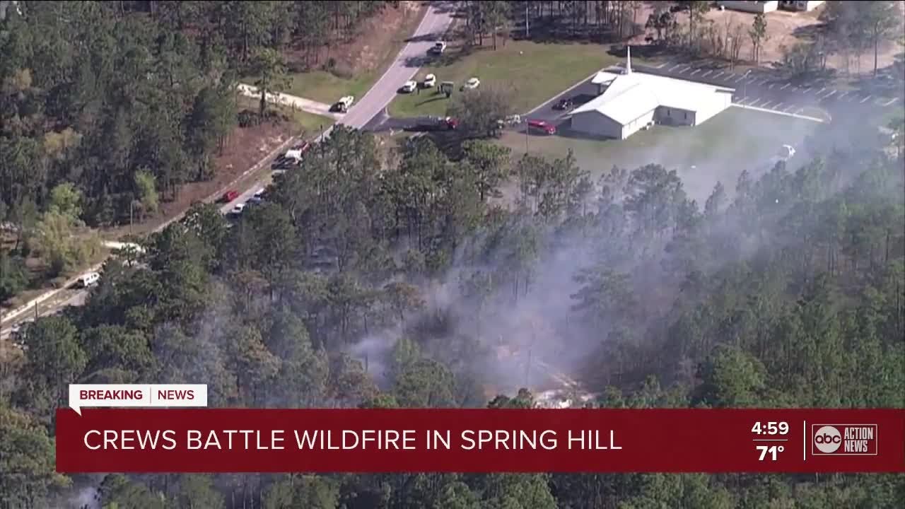 Crews battle 5-acre brush fire in Spring Hill - YouTube
