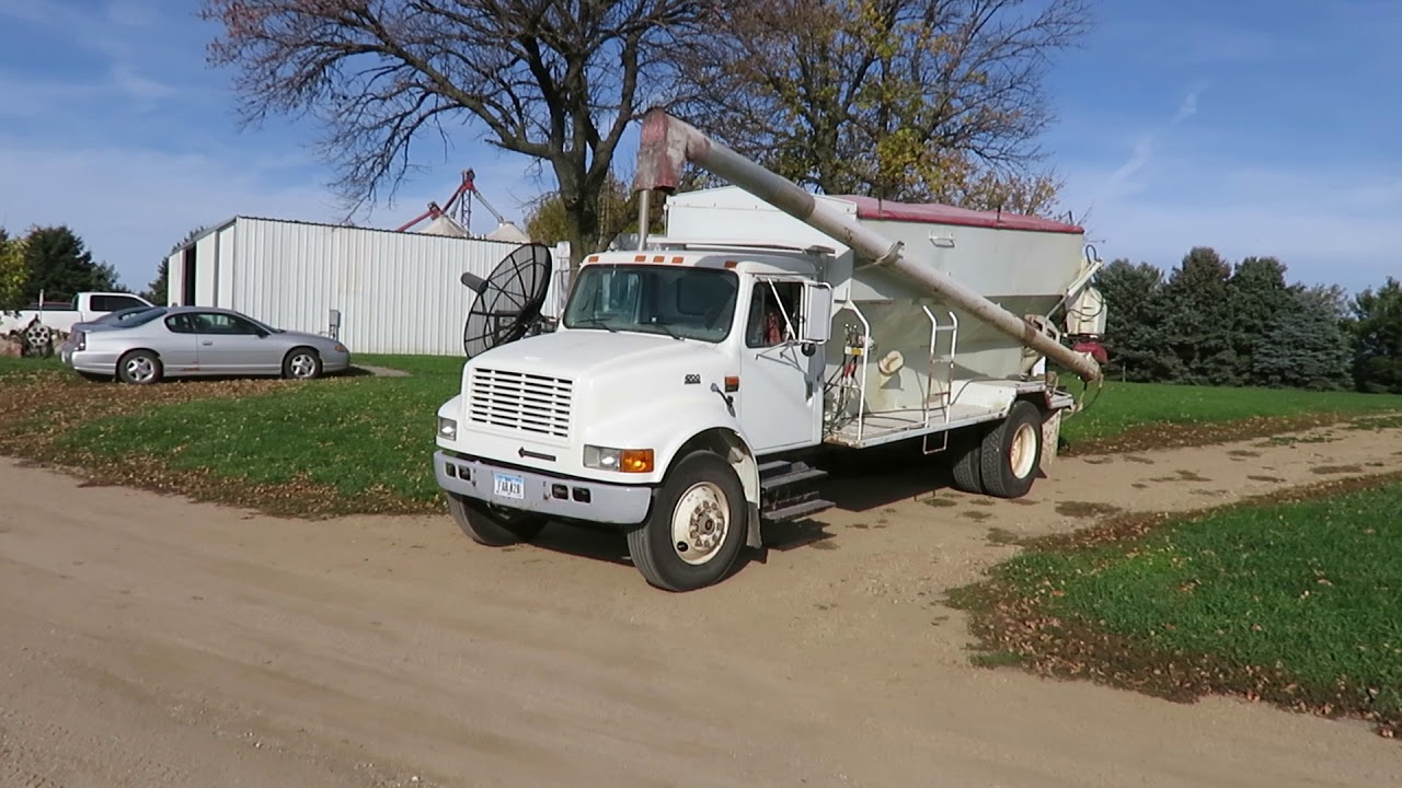 International 4700 with Sudenga Feed Body MVI 3124 - YouTube