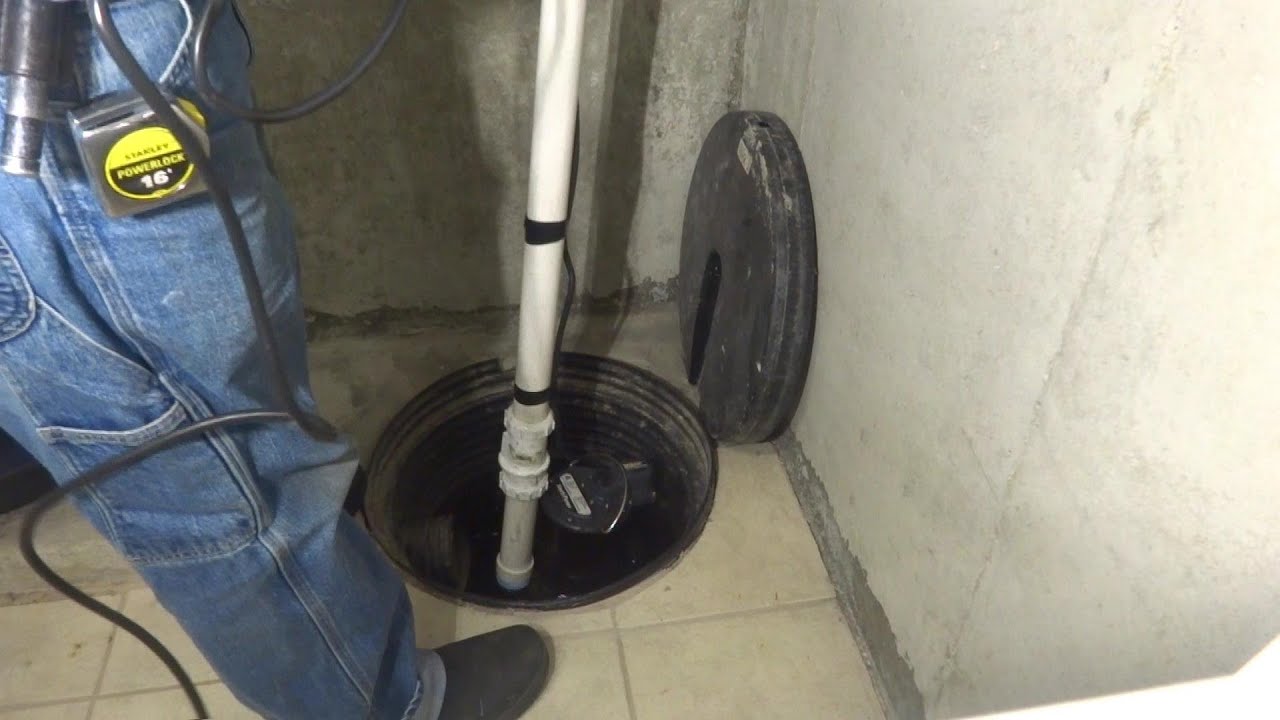 INSTALL SUMPPUMP IN BASEMENT PIT AND RUN PIPING OUTSIDE - YouTube